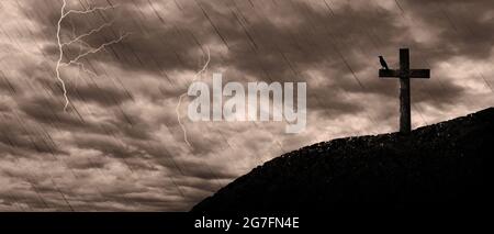 Cross in the cloudy sky with light rays Stock Photo - Alamy
