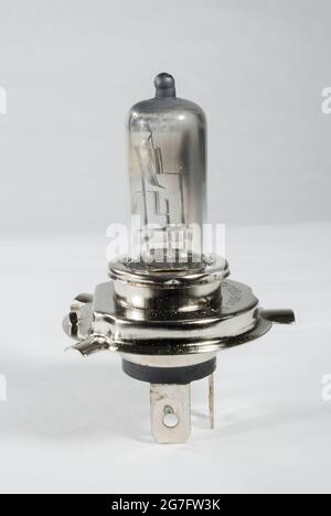 car burned out headlight lamp H7 with clipping path on white glass ...