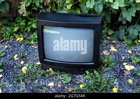 Old Analog Television Set on the Grass Background outdoor Stock Photo ...