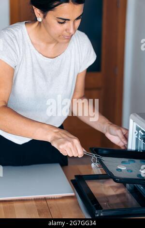 woman using oven Stock Photo - Alamy