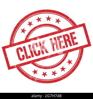 CLICK HERE text written on red grungy stamp sign Stock Photo - Alamy