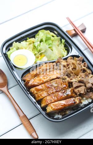 Chicken rice bento Stock Photo - Alamy