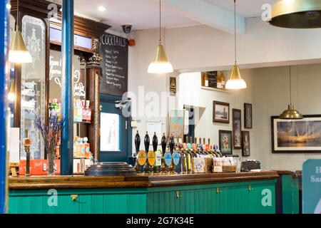 The pumps at a bar in the UK showing a range of alcoholic beverages ...
