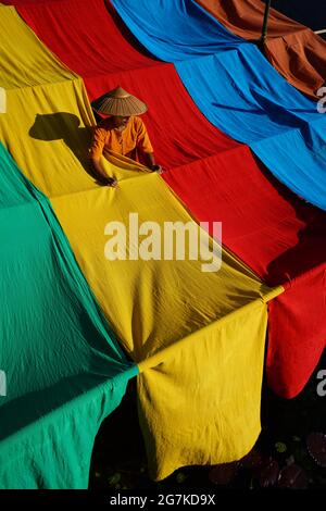 Colorful clothes in Inle lake Myanmar Stock Photo - Alamy