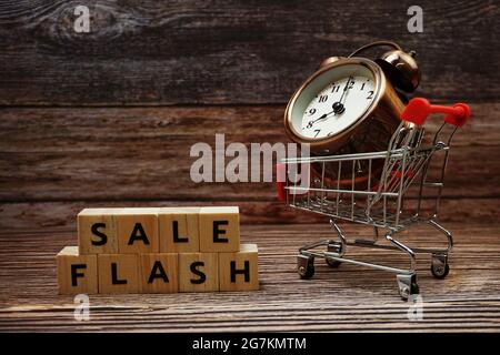 Flash Sale message alphabet letter on wooden background Stock Photo - Alamy