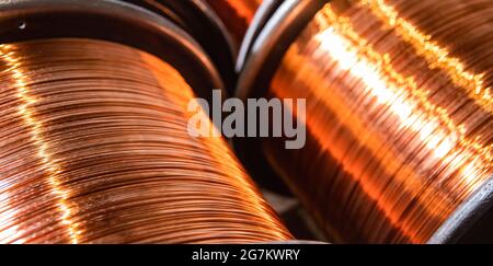 Banner copper cable industry factory, coil background with sun light ...