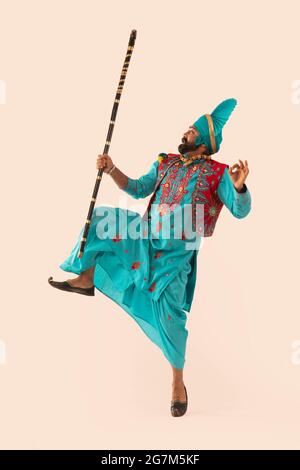 A Bhangra Dancer performing a dance step with hand gestures Stock Photo ...
