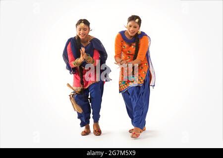 Two Giddha Dancers performing a dance step together Stock Photo - Alamy