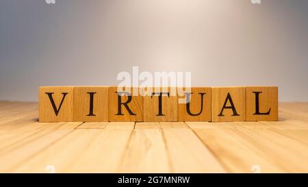 The word virtual was created from wooden cubes. Technology and life ...