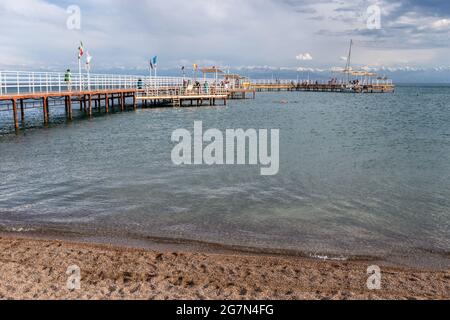 Pier, Kapriz Issyk Kul Resort lake, Kyrgyzstan Stock Photo - Alamy