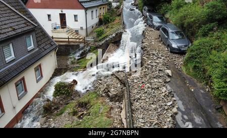Altena, Germany. 15th July, 2021. Flooded streets in Altena after heavy ...