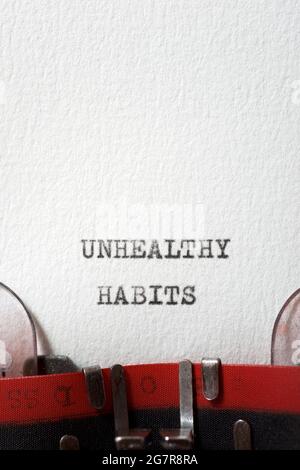 Unhealthy habits phrase written with a typewriter Stock Photo - Alamy