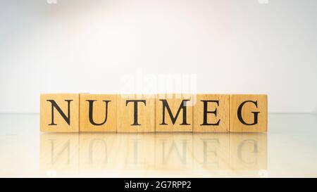 The word Nutmeg was created from wooden letter cubes. Gastronomy and ...