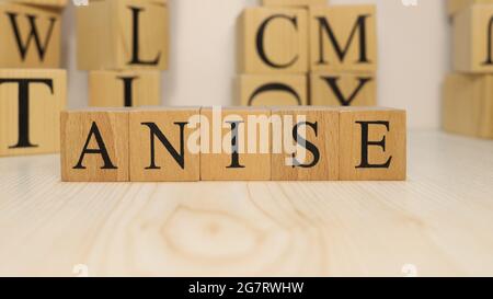 The word Anise was created from wooden letter cubes. Gastronomy and ...