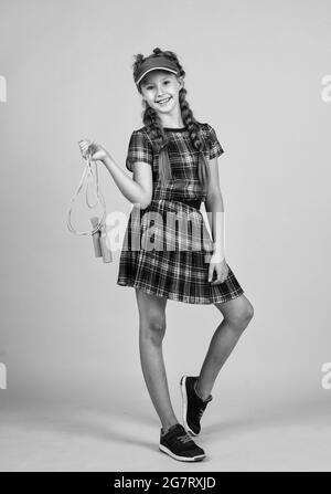 teen kid in fitness cap holding skipping rope for jumping, activity Stock Photo - Alamy