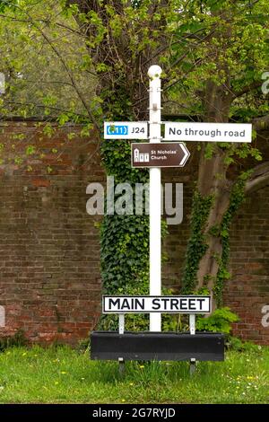 Old village sign post example Stock Photo - Alamy