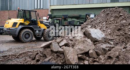 Hagen, Germany. 16th July, 2021. A Bundeswehr crane truck stands ready ...