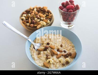 Mixed nuts in a glass plate. Healthy and natural nutrition .Cashew ...