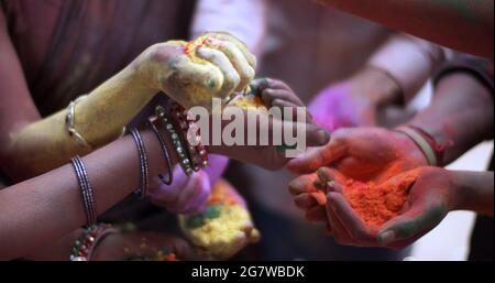 Painted hands of people at the Holi Hindu festival of Color in India ...