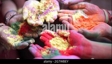 Painted hands of people at the Holi Hindu festival of Color in India ...
