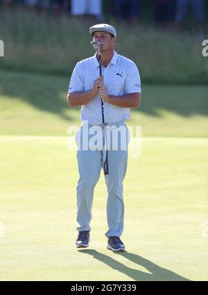 Bryson DeChambeau reacts after missing a putt on the 16th hole during ...