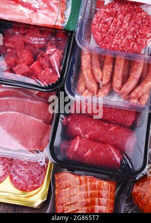 Composition with packages of assorted meat products Stock Photo - Alamy