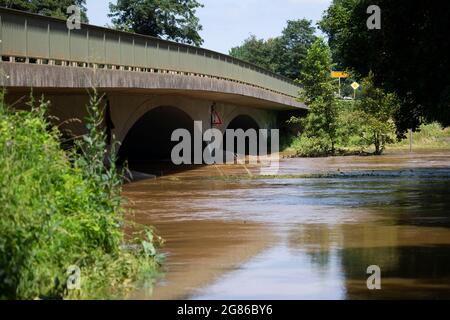 Orsbeck, Germany. 17th July, 2021. A sign near flooded meadows near ...
