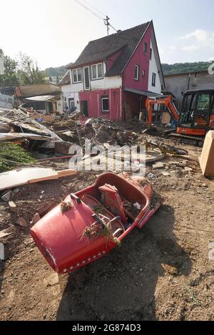 Schuld, Germany. 17th July, 2021. A man walks through the completely ...