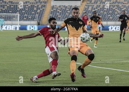 Al Ahly's Hussein El Shahat kicks the ball into Porto's Francisco Moura ...