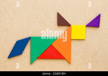 Color tangram in shape ox, buffalo or bull on wood background Stock ...