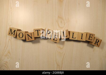 The word Montpellier was created from wooden letter cubes. Cities and ...