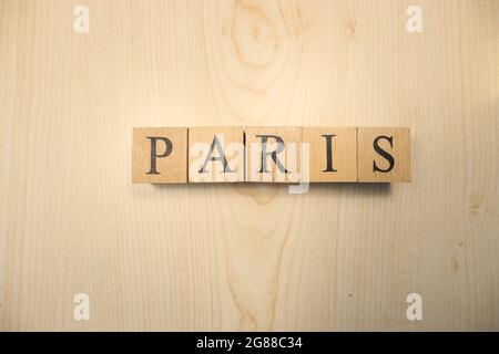 The word Paris was created from wooden letter cubes. Cities and words ...