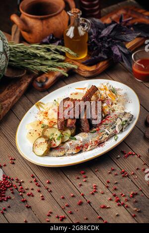 Traditional russian snacks with herring and pickle Stock Photo - Alamy