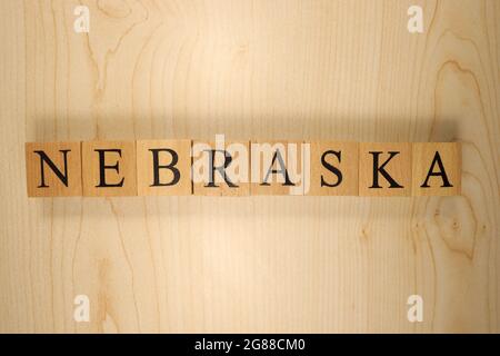 The word Nebraska was created from wooden letter cubes. Cities and ...