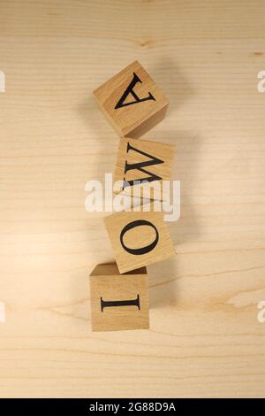 The word Iowa was created from wooden letter cubes. Cities and words ...