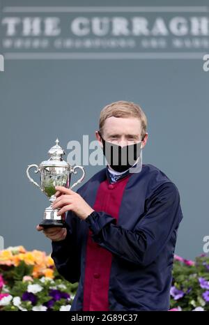 Jockey Billy Lee with the trophy after winning the Kilboy Estate Stakes ...