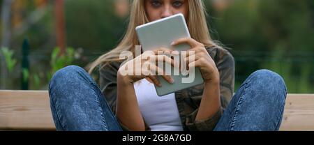 Attractive young girl staring intently at camera Stock Photo - Alamy