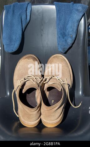 A pair of traditional South African velskoene shoes isolated on a clear ...