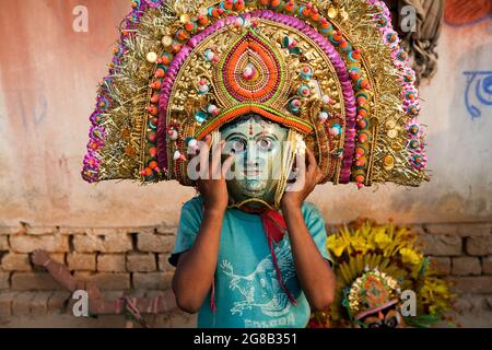 Chou dancers preparing for chou dance, a folk dance of India, where ...