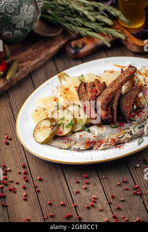 Traditional russian snacks with herring and pickle Stock Photo - Alamy