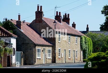 Houses in the village of Hotham, East Yorkshire, England UK Stock Photo ...