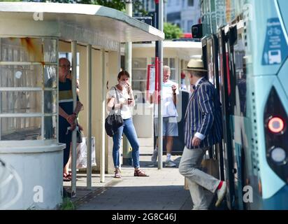 Passengers wear face masks in the main train station in Frankfurt ...