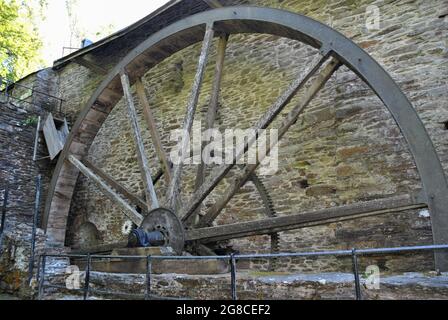 A big waterwheel used to drive the bellows of a furnace, used from the ...