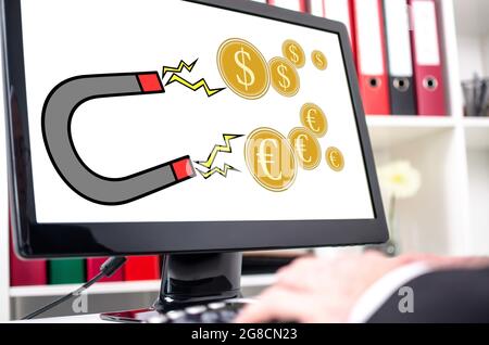 Money attraction concept shown on a computer screen Stock Photo - Alamy
