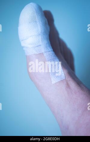 Foot big toe bandage injured feet in medical clinic hospital center ...