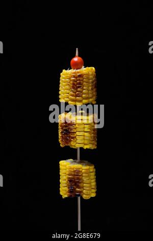 Grilled corn on the corn cob, cut up, on plate, Germany, Europe Stock ...