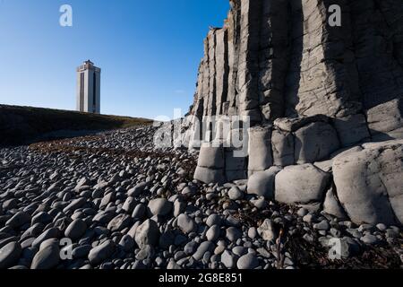 Basalt cliff and beach with rounded stones, Kalfshamarsvik, Skagi ...