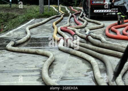 Glogoczow, Poland. 18th July, 2021. Pumps are seen pumping out water ...