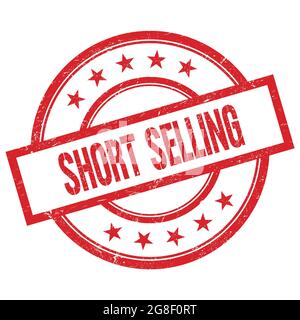 SHORT SELLING text written on blue round vintage rubber stamp Stock ...