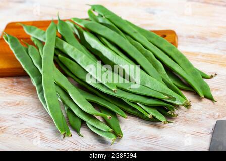 Edible pods of flat bean / helda bean / romano beans plant in kitchen ...